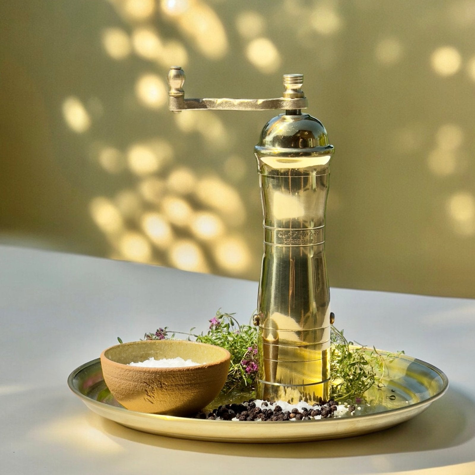 Buy the Alexander 'Athena Mill' brass pepper mill with crank handle from us
